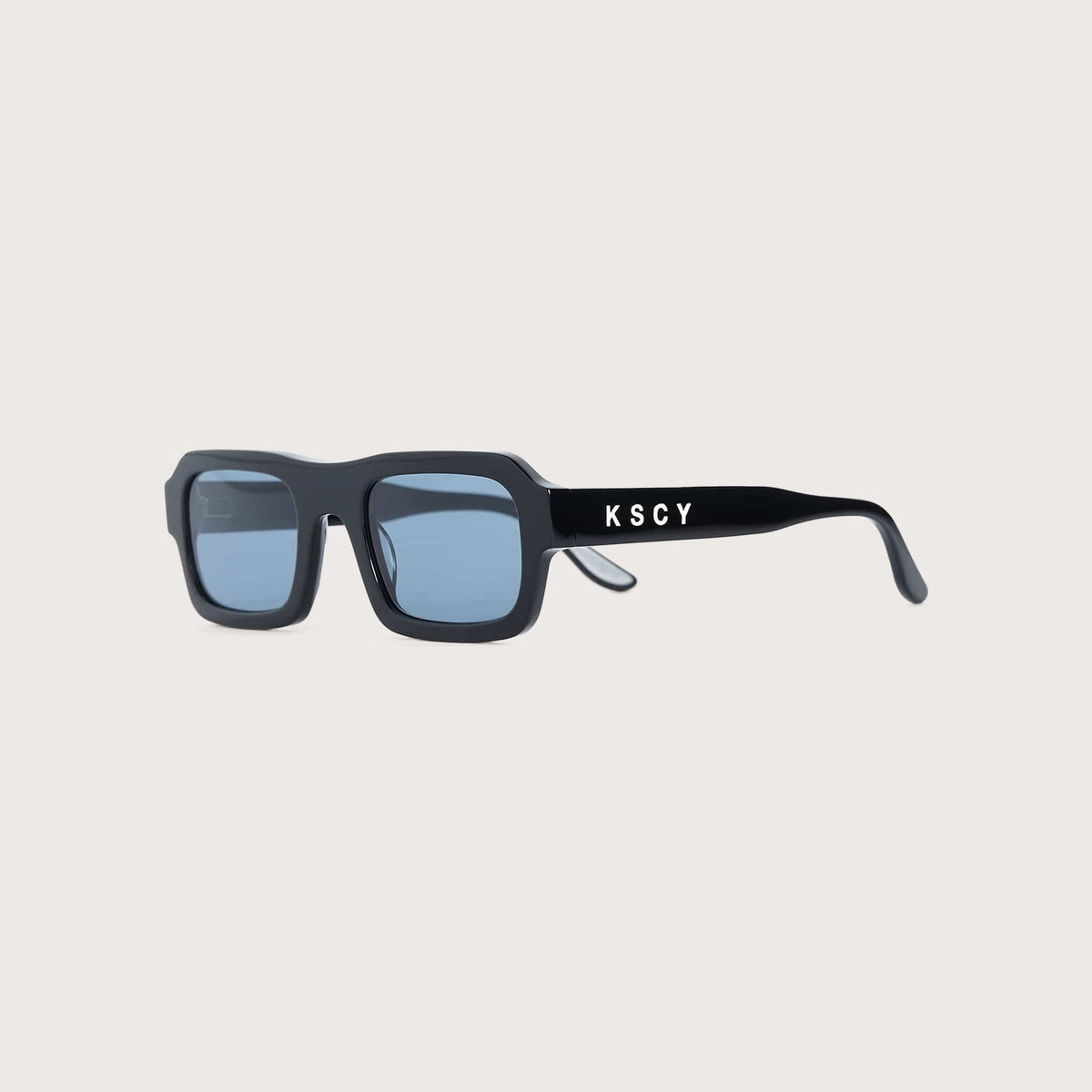 Conman Sunglasses in Transparent Blue | Kiss Chacey